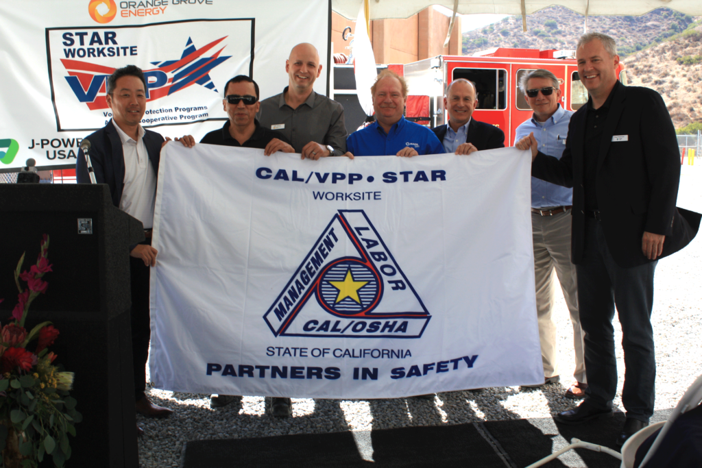 Power-team-displays-the-VPP-flag - | CAL-OSHA Reporter